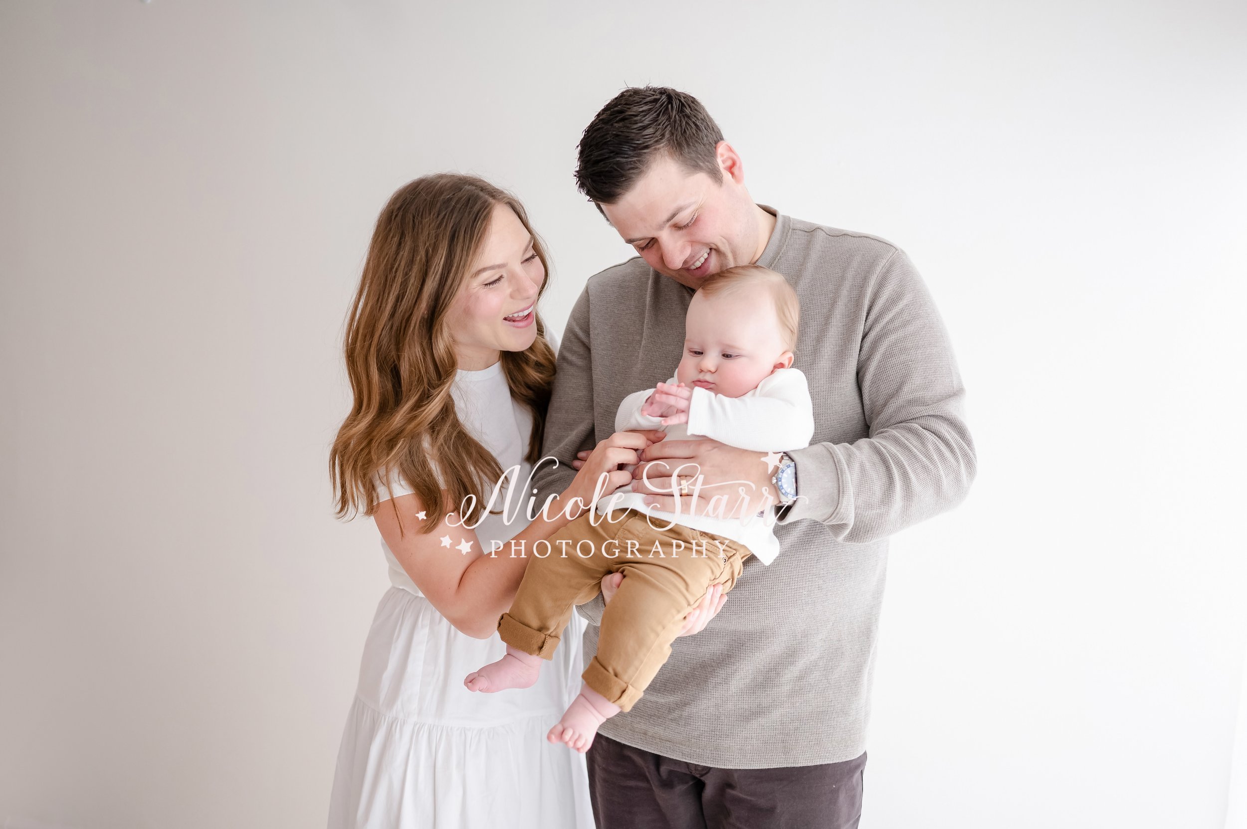 And baby makes three: Adorable and playful studio portraits with three ...